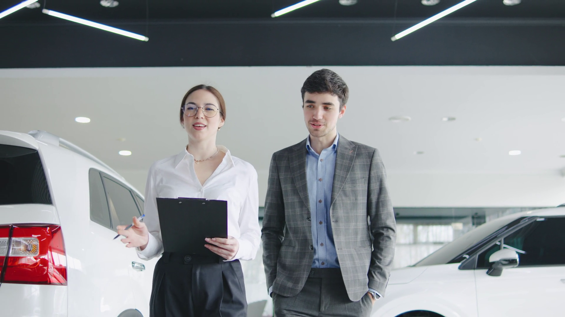 Car Dealership Staff Customer In Selecting Stock Footage SBV-352016672 ...