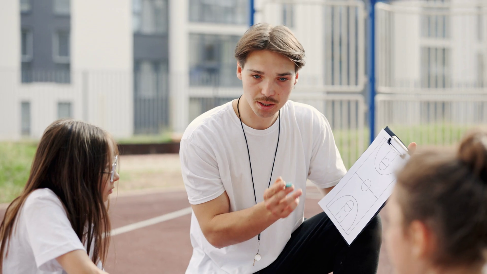 Sporty Coach Explaining Game Strategy To Stock Footage SBV-347805131 ...