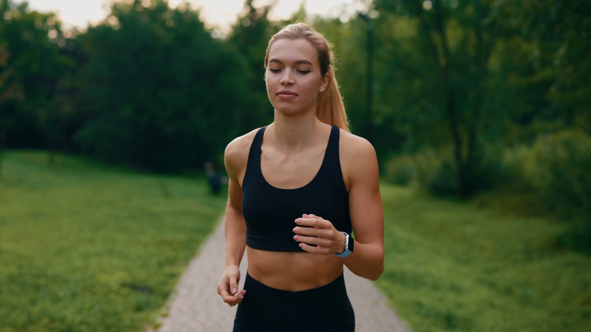 Female Runner Is Jogging In Park Wearing Stock Footage SBV-347805022 ...