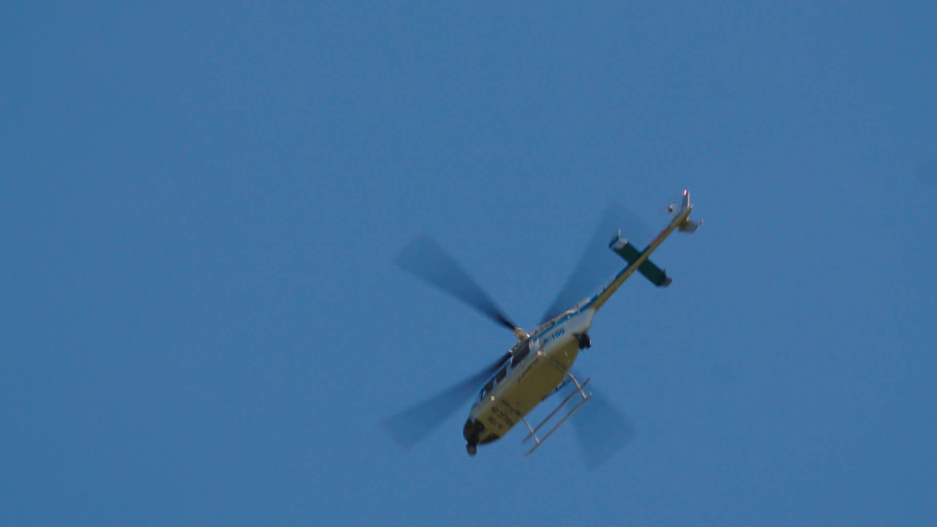 Helicopter Soaring Above Clear Skies Of Stock Footage SBV-352111224 ...