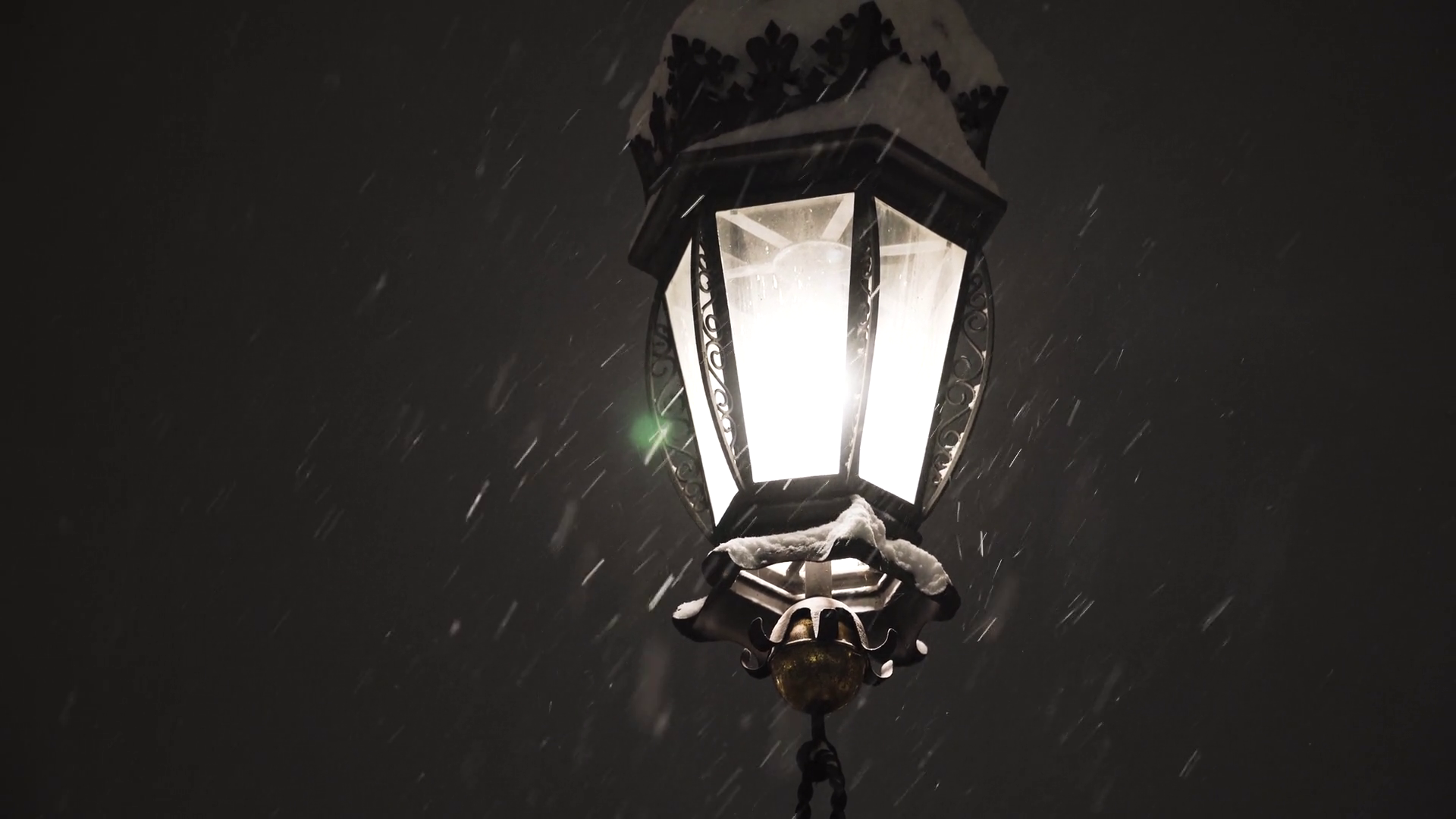 Snowfall Illuminates Lantern On Quiet Street Stock Footage SBV ...