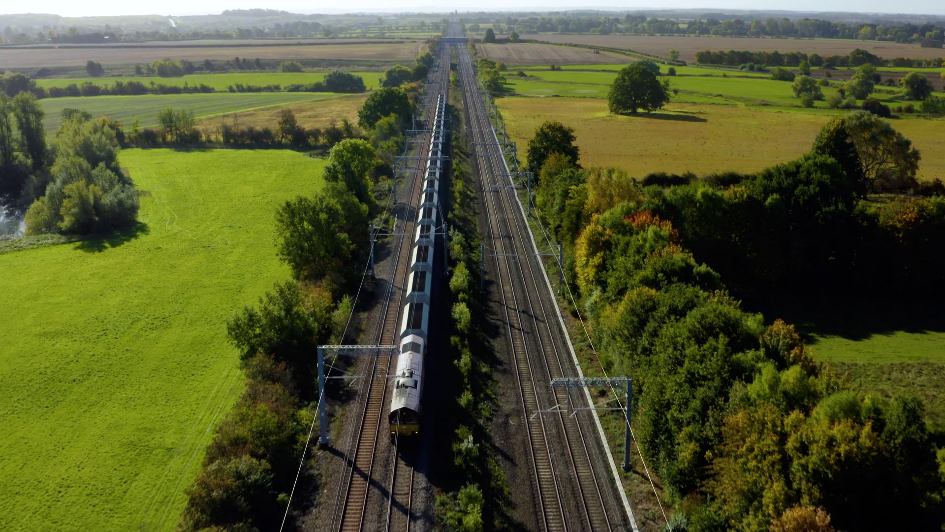 Aerial View Of Train Traveling Through Lush Stock Footage SBV-351666003 ...