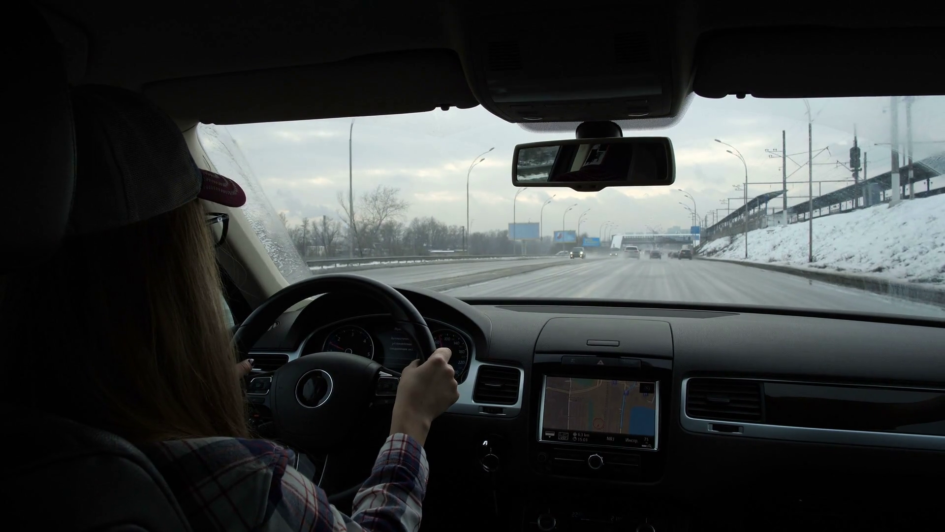 Young Woman Carefully Drives Car On Winter Stock Footage SBV-347338319 ...