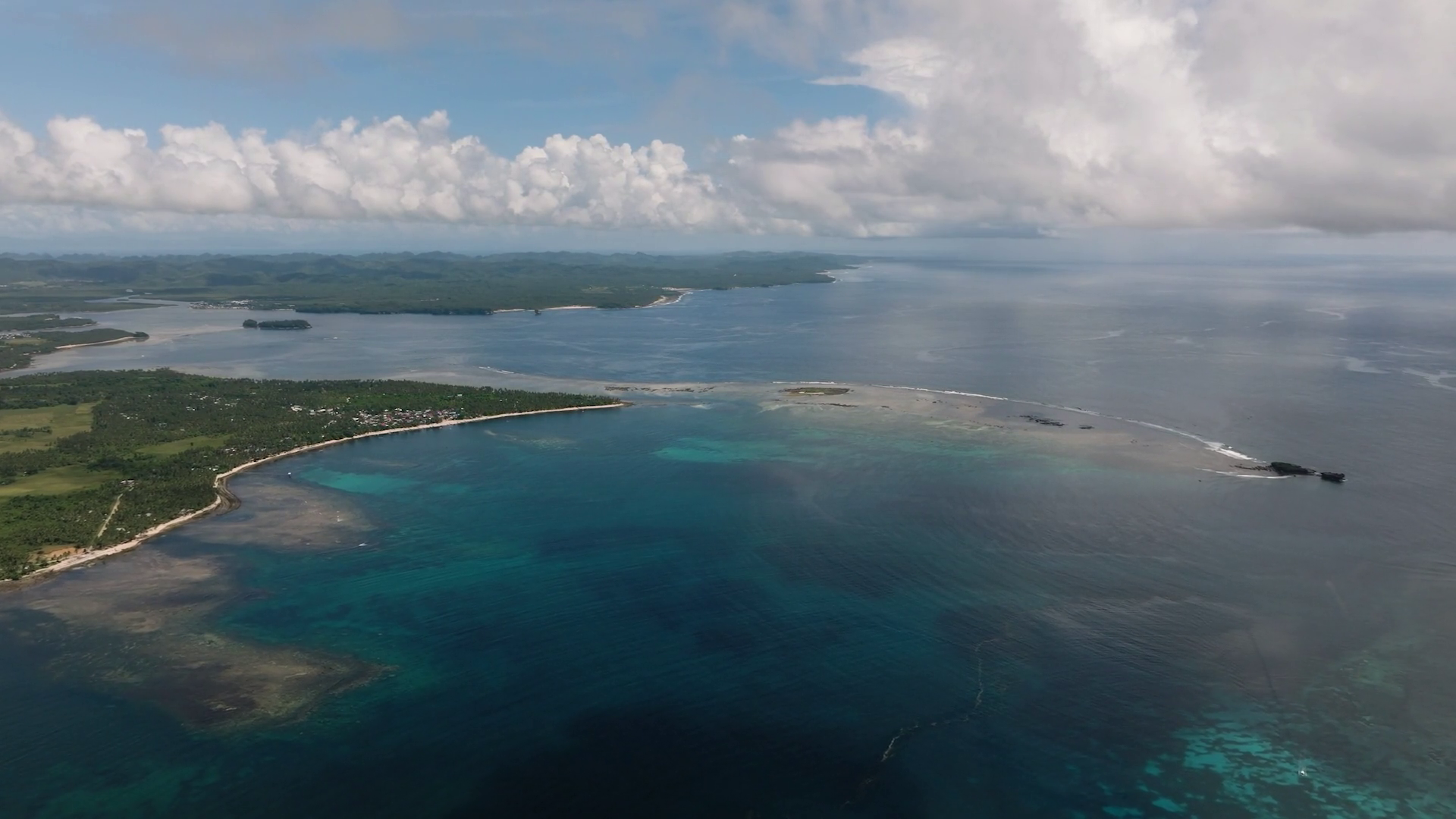 Shoreline With Coral Reef Village Along Stock Footage SBV-353486407 ...