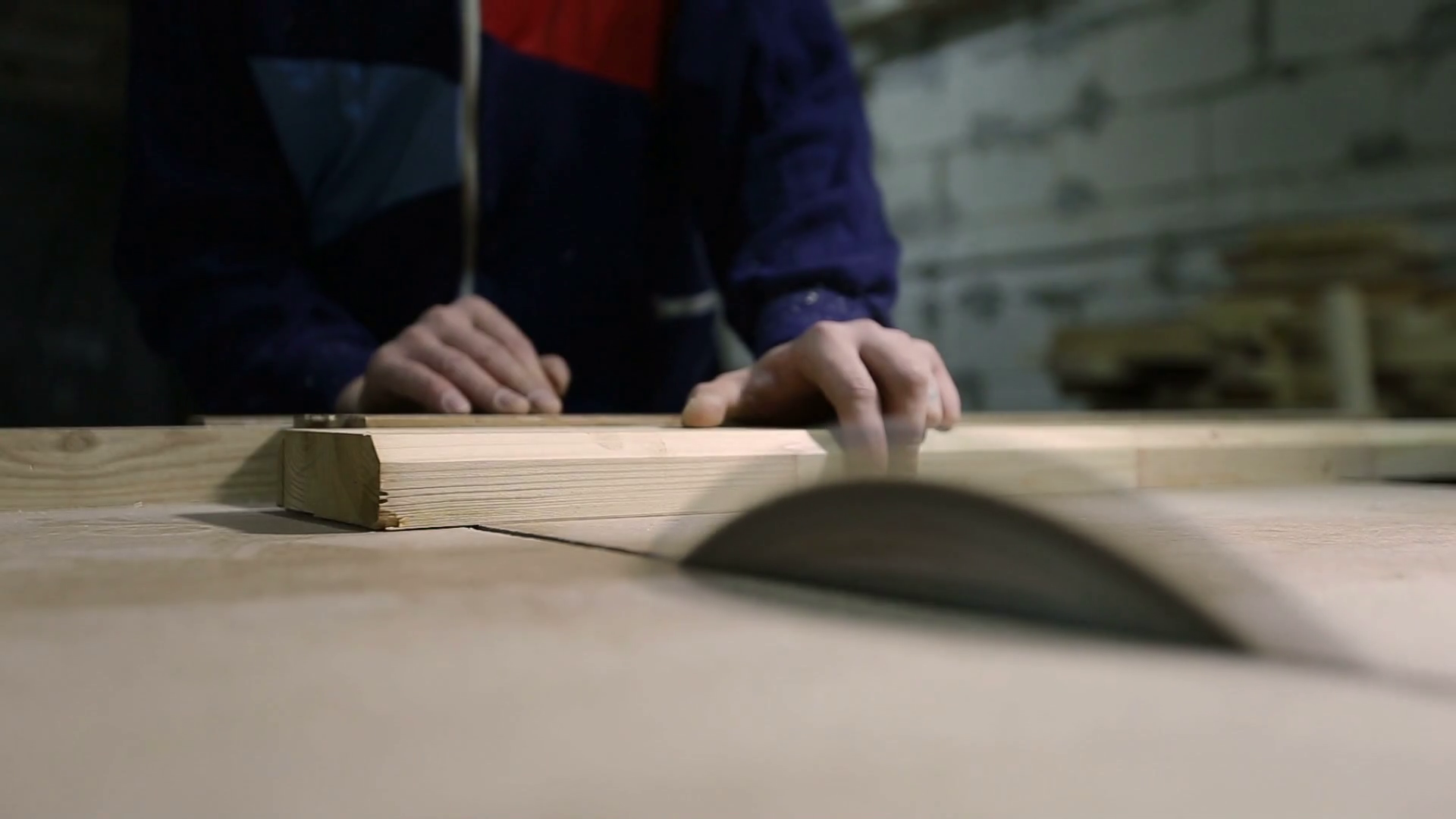 Carpenter Cutting Wooden Plank With Table Saw Stock Footage SBV ...