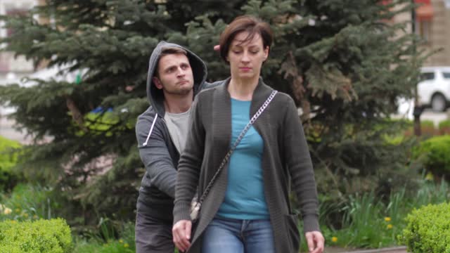 Man Defending Woman Stock Footage: Royalty-Free Video Clips - Storyblocks