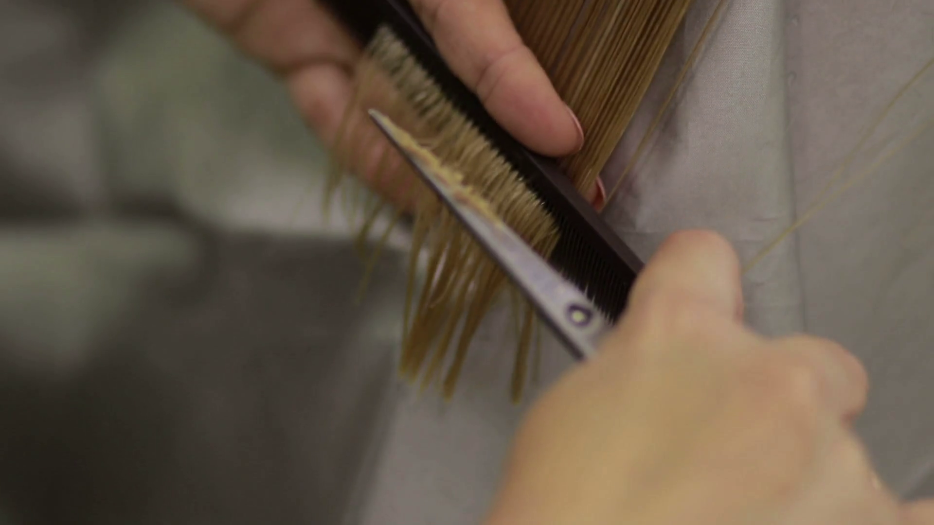 Female hairdresser hands cutting hair tips Stock Video Footage 00:14 ...