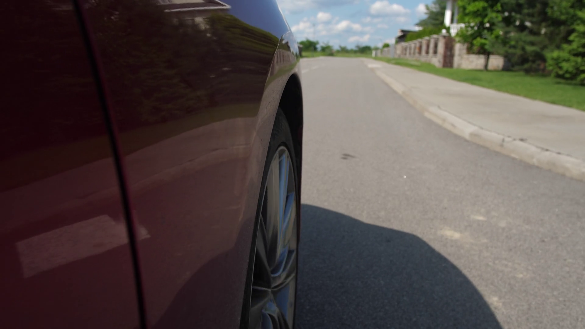 Front Tire Of Glossy Red Car Spinning Wheel Stock Footage SBV-336487612 ...