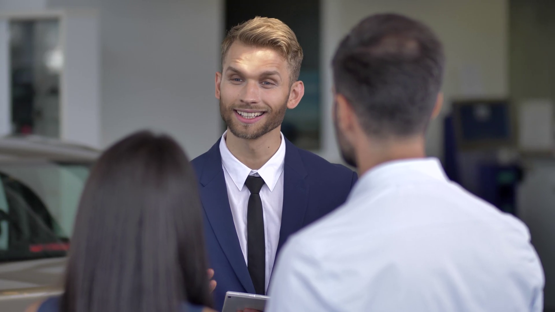 Friendly Auto Dealer Assisting Customers In Stock Footage SBV-339018744 ...