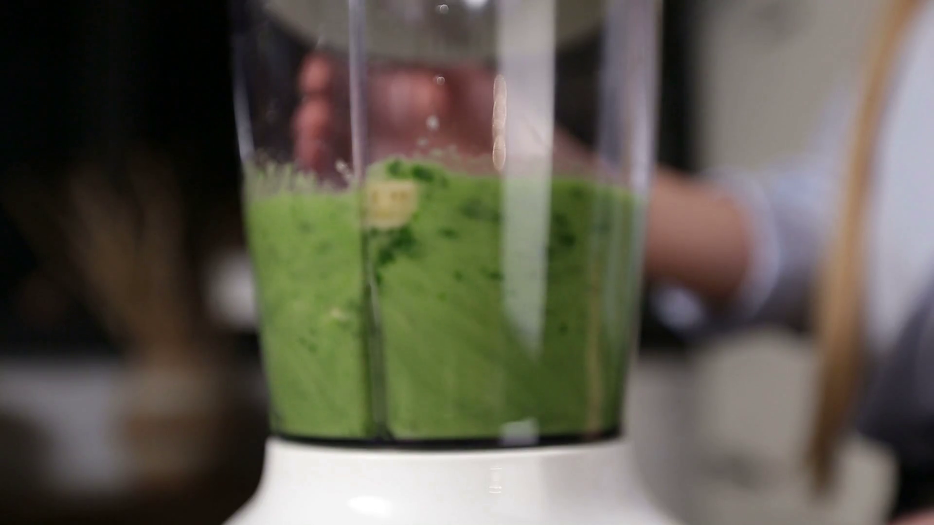 Woman Blending Ingredients To Make Green Stock Footage SBV-312819465 ...