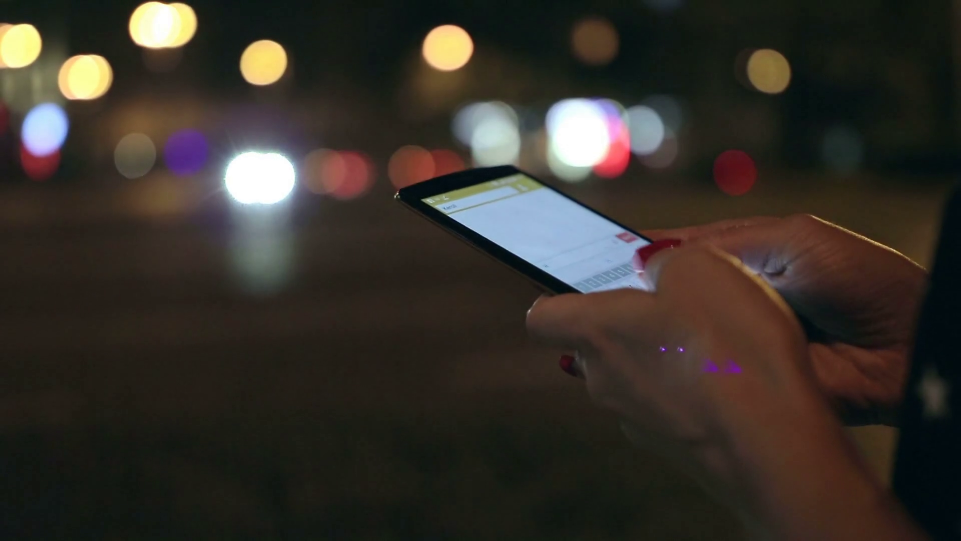 Woman texting on mobile phone on street at night Stock Video Footage 00 ...