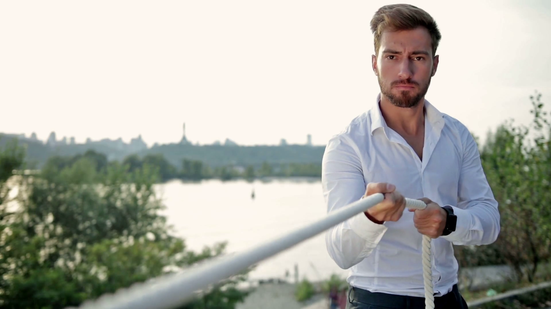 Businessman Demonstrating Strength Outdoors Stock Footage SBV-309250407 ...