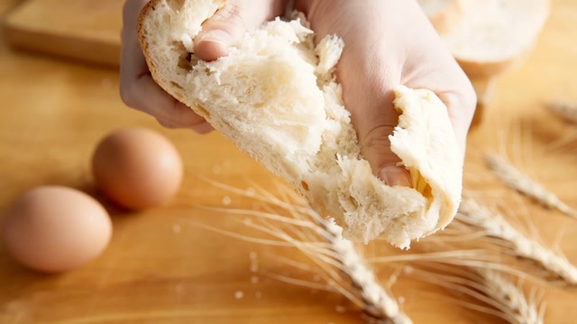 Breaking Bread Stock Footage: Royalty-Free Video Clips - Storyblocks