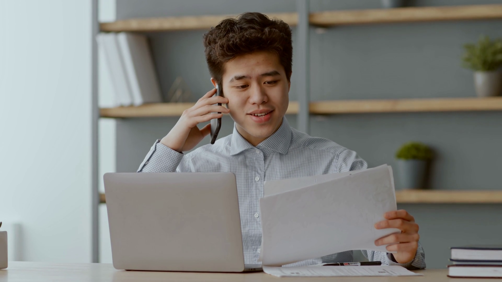 A Young Asian Man Sits At Home Office Desk Stock Footage SBV-351742538 ...