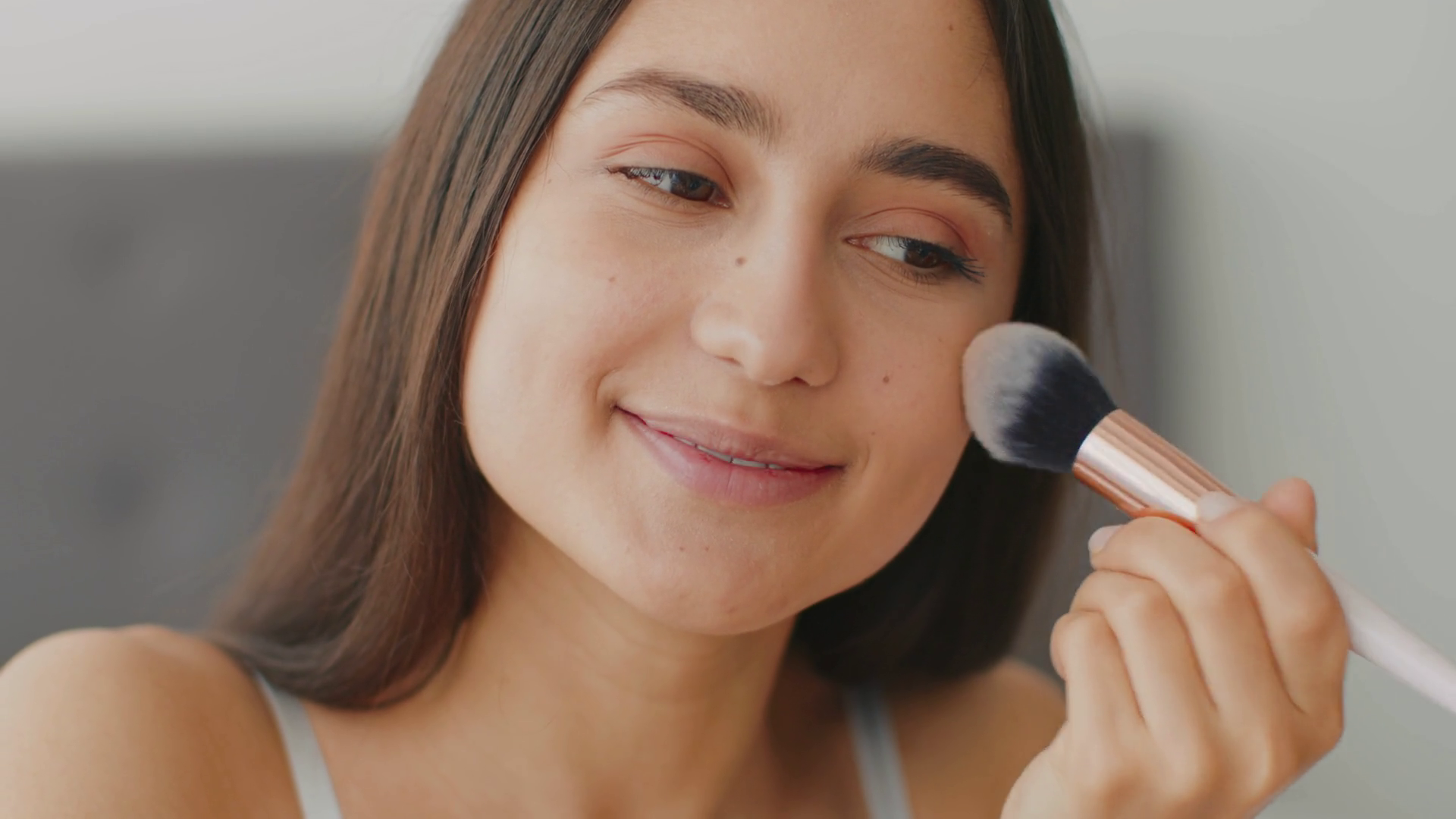 A Young Middle Eastern Woman Smiles Applying Stock Footage SBV ...