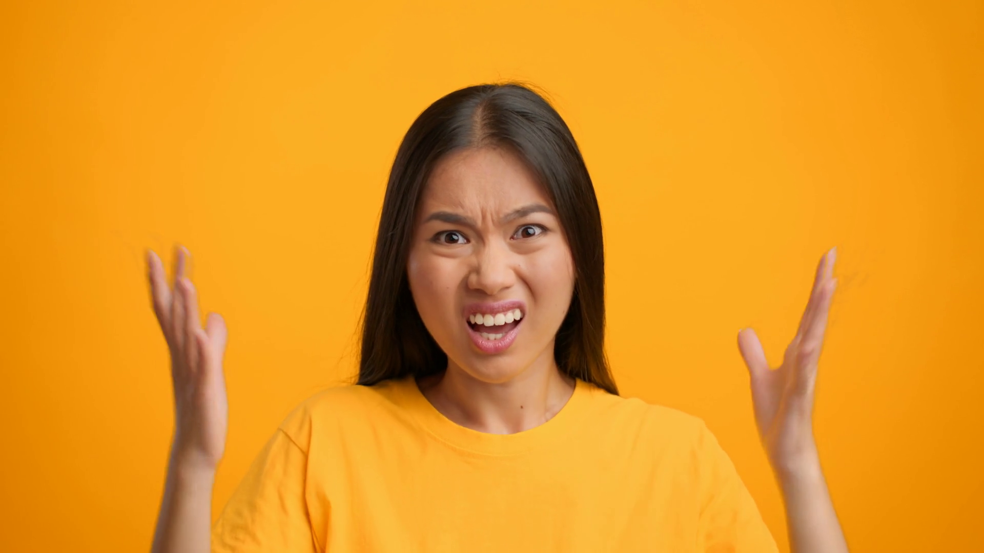 A Millennial Asian Woman Makes Humorous Face Stock Footage SBV ...