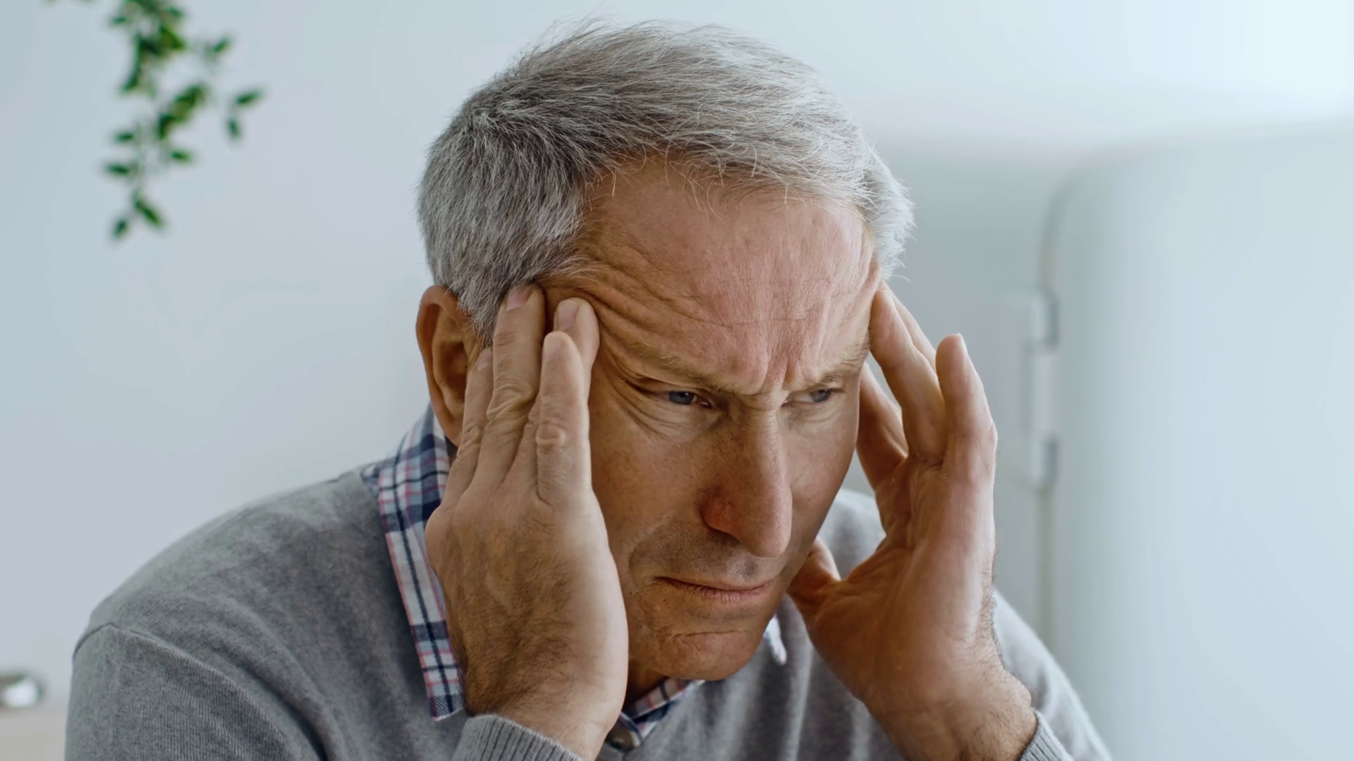 A Senior Man In 60s Is Sitting At Home With Stock Footage SBV-353164046 ...