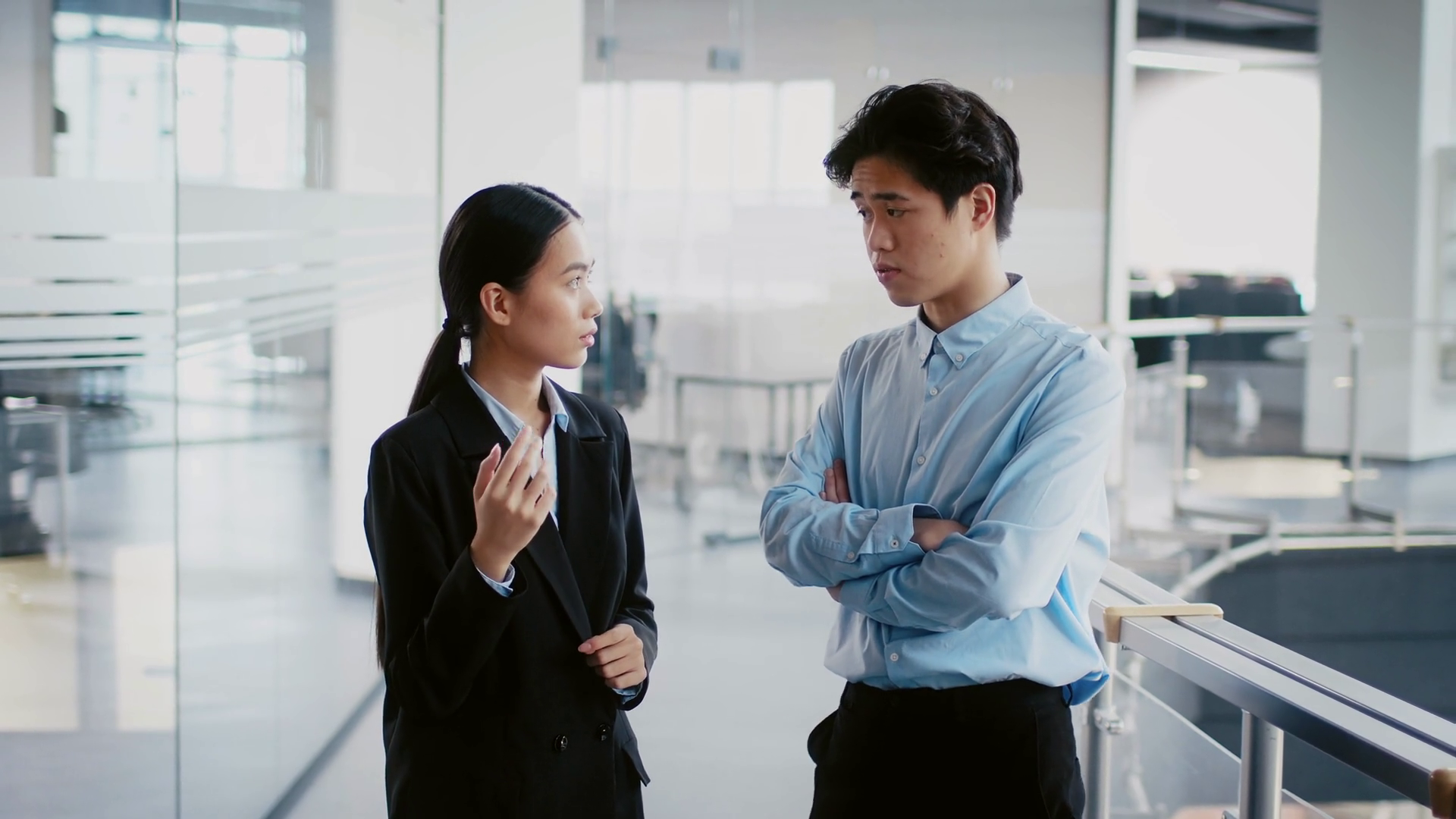 Two Young Asian Professionals Hold Stock Footage SBV-353152630 ...