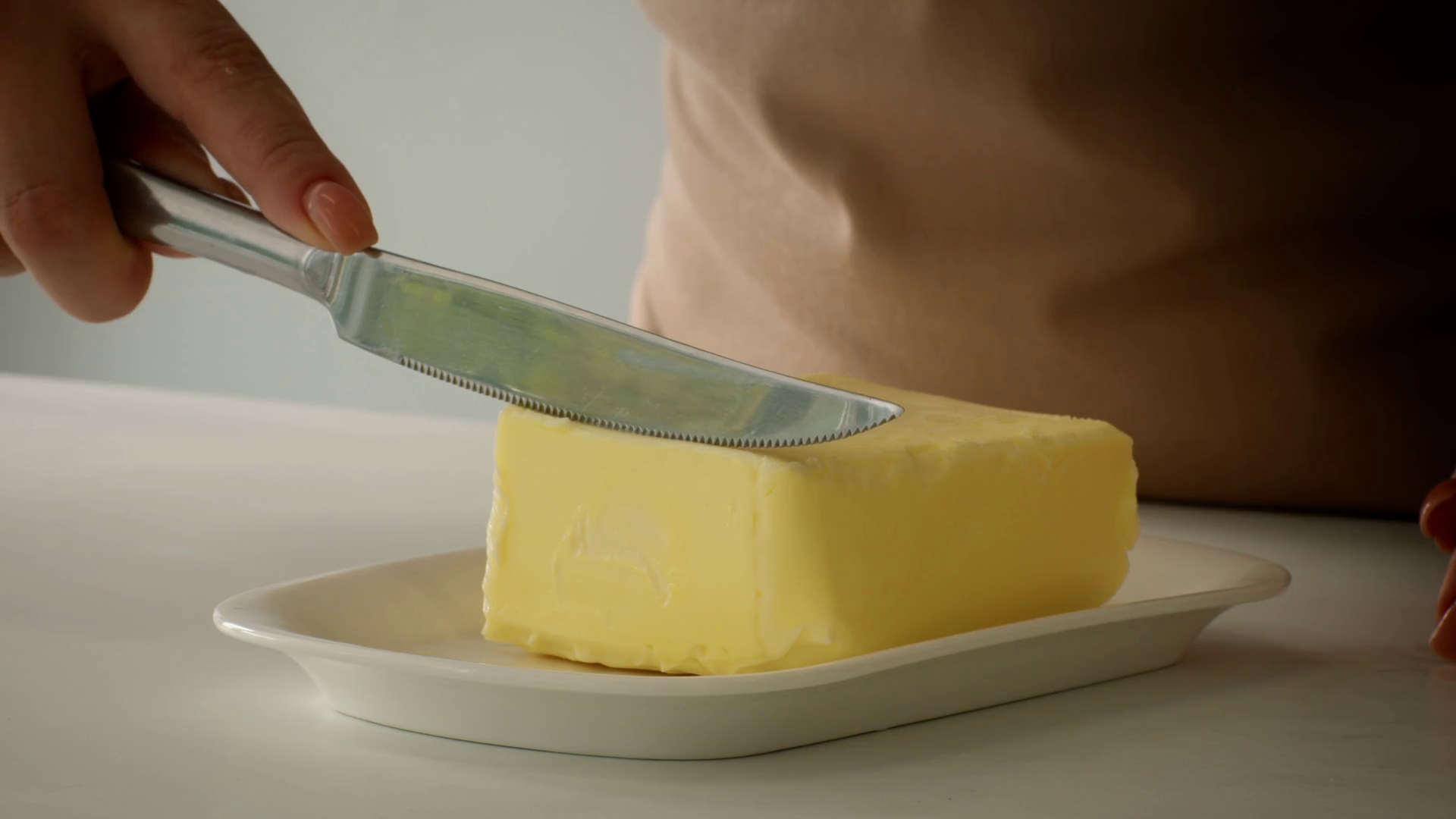Unrecognizable Lady Cutting Butter In Slices Cooking In Kitchen ...