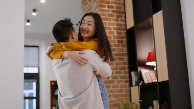 Man Meeting A Woman And They Spin Hug Stock Footage: Royalty-Free Video ...