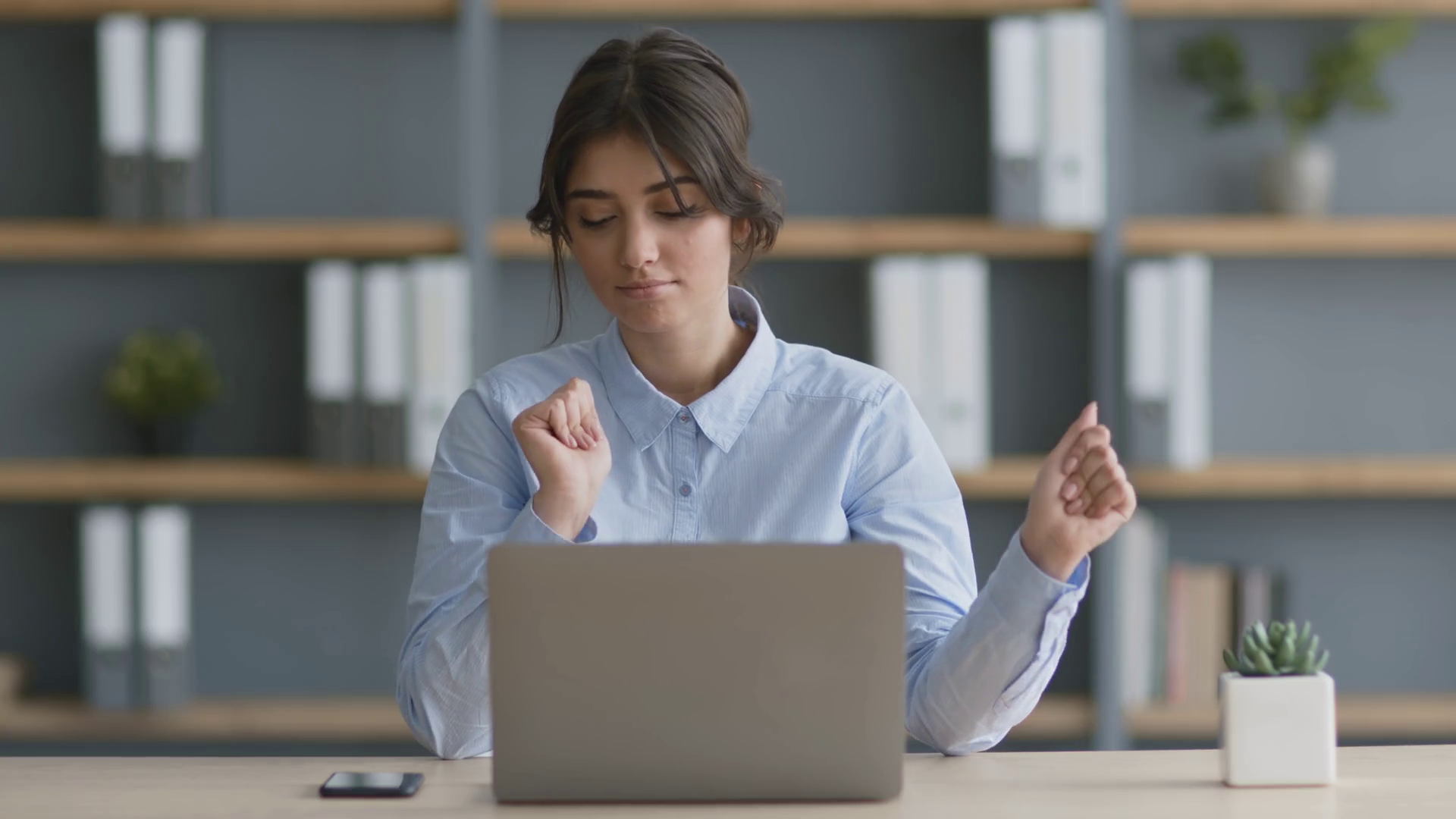 End of working week. Young happy lady office worker dancing at ...