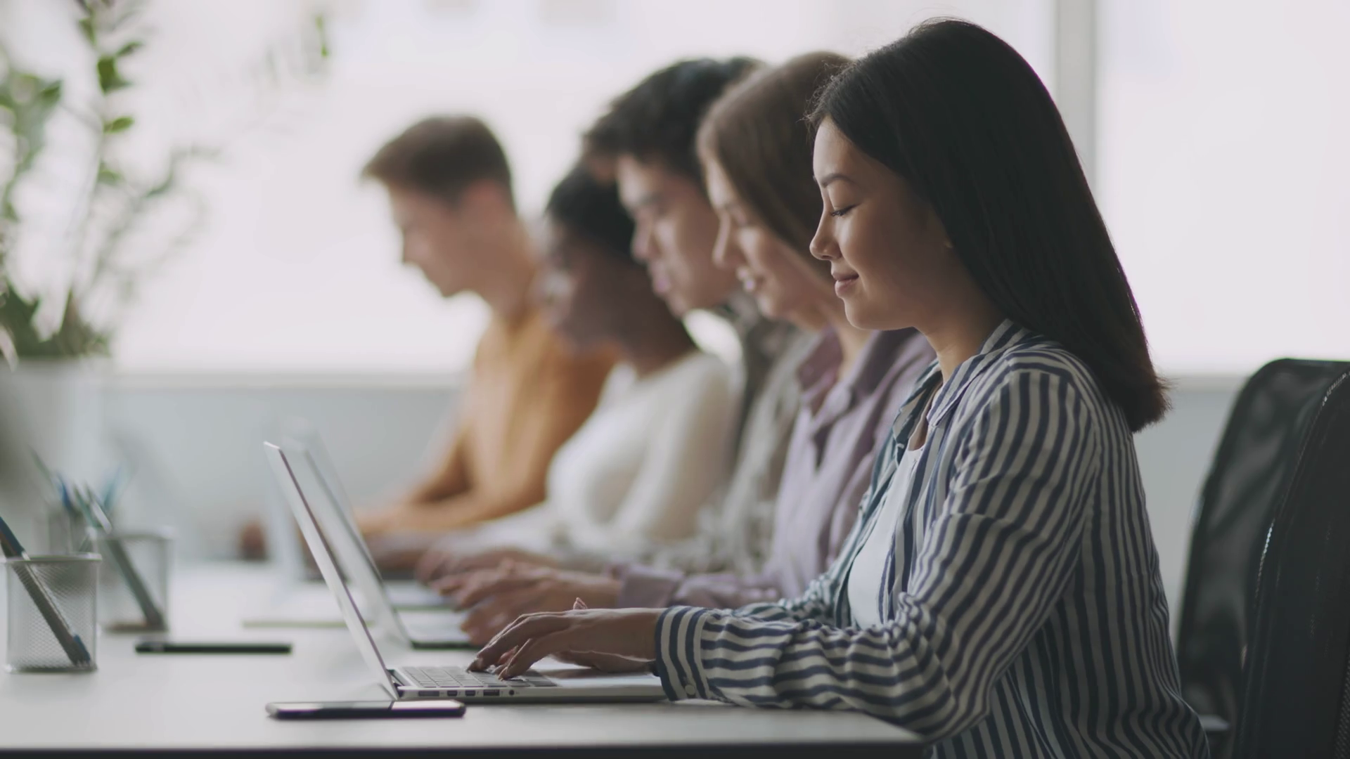 Group Of Diverse Future It Specialists Typing On Laptop During Lesson Asian Girl Asking For