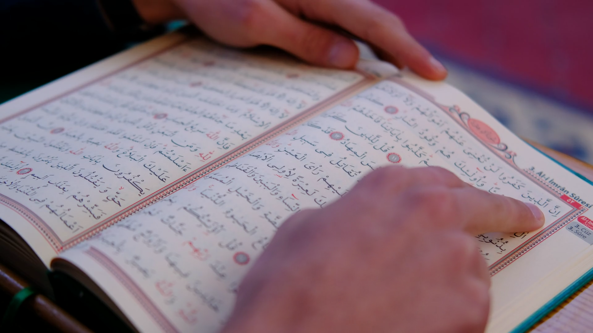 Close-up Of Hand Following Lines Of Quran Stock Footage SBV-347677233 ...