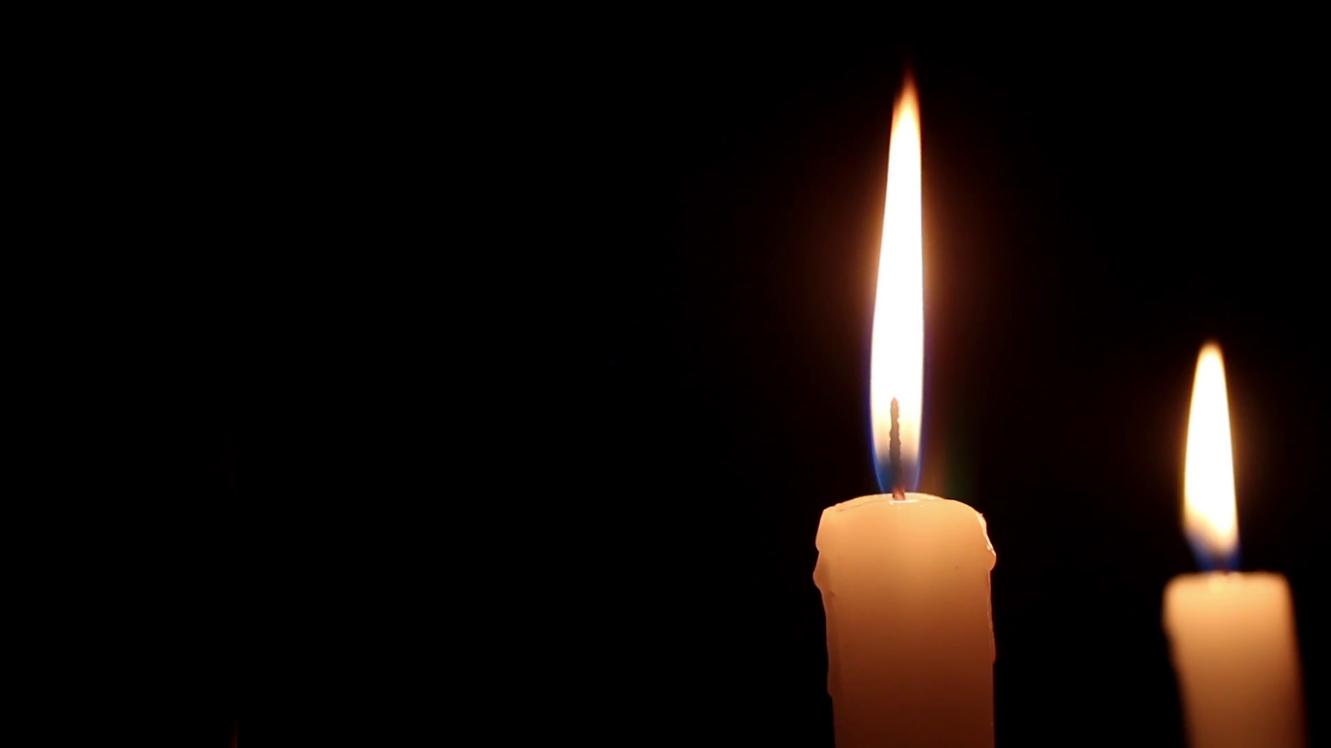 Long Short Candles Burning On Dark Stock Footage SBV-347674970 ...