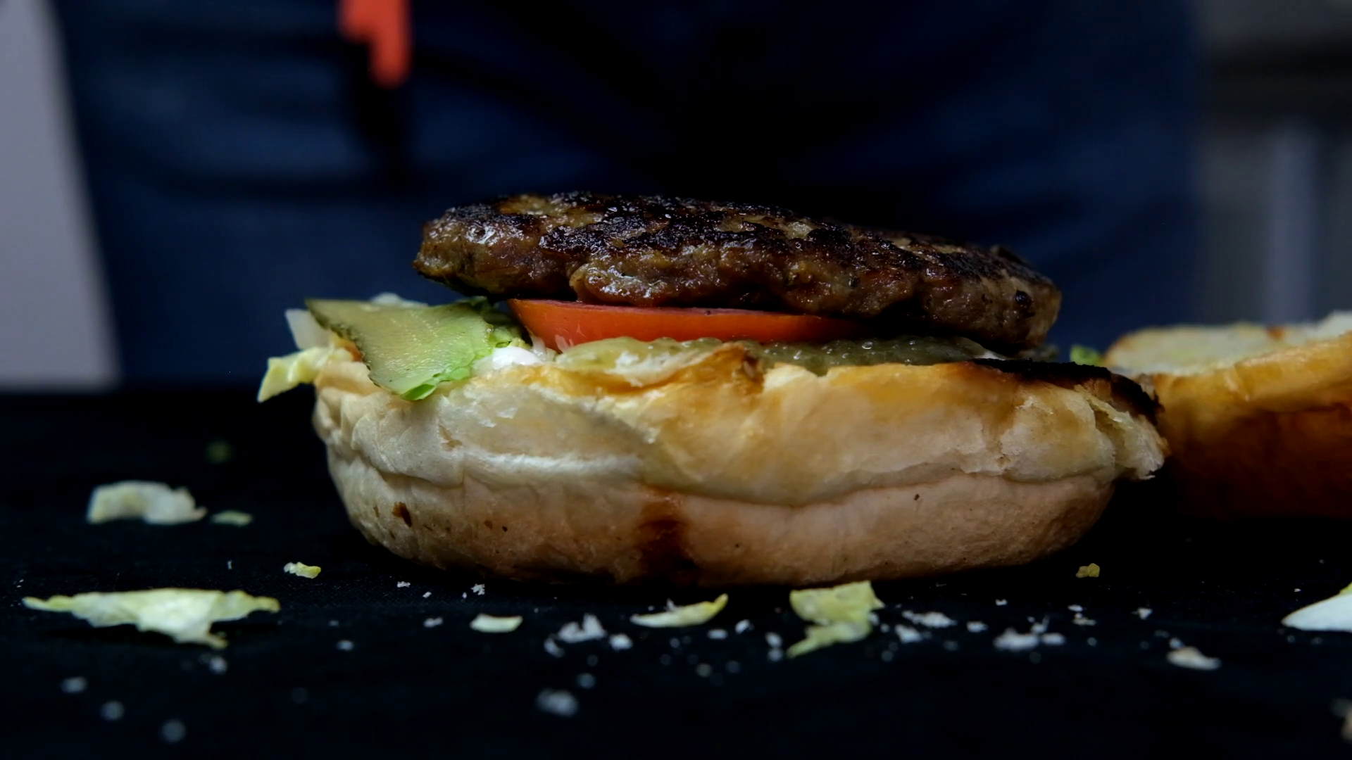 Slow Motion Shot Of Layered Hamburger Making Stock Footage SBV ...