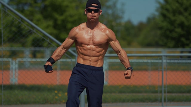 Muscular Man Walking Stock Footage: Royalty-Free Video Clips - Storyblocks