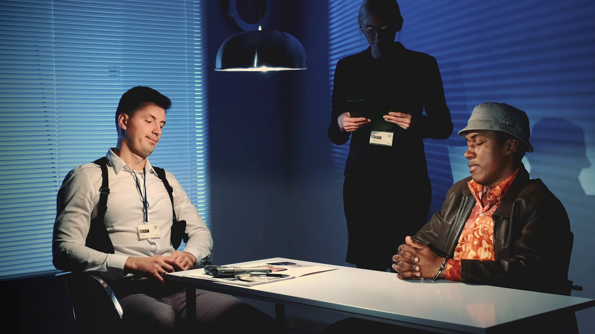 Medium Shot Of Detective Showing Picture Of Stock Footage SBV-338799337 ...