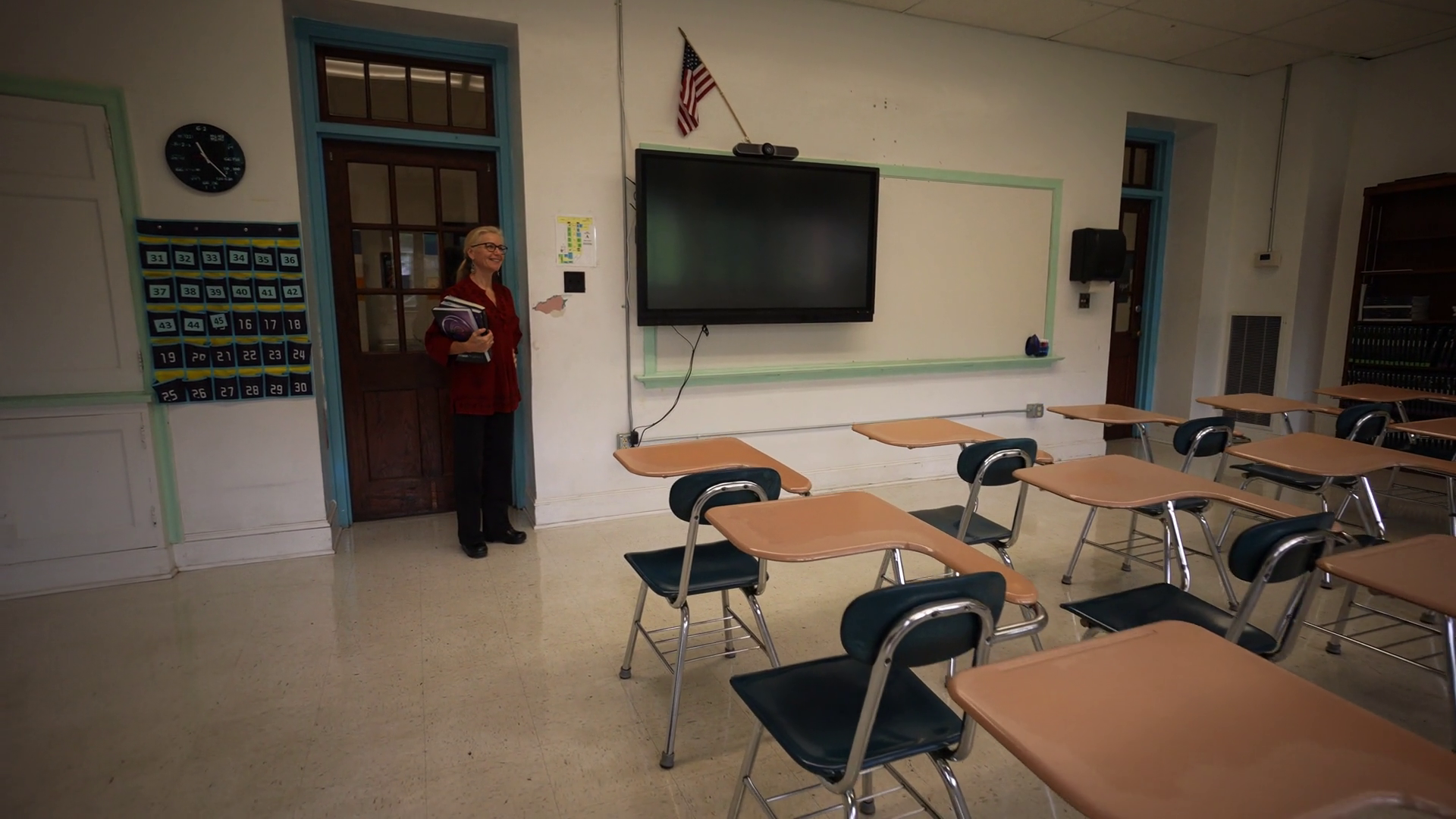 Happy Teacher Entering Empty Classroom Stock Footage SBV-352707217 ...