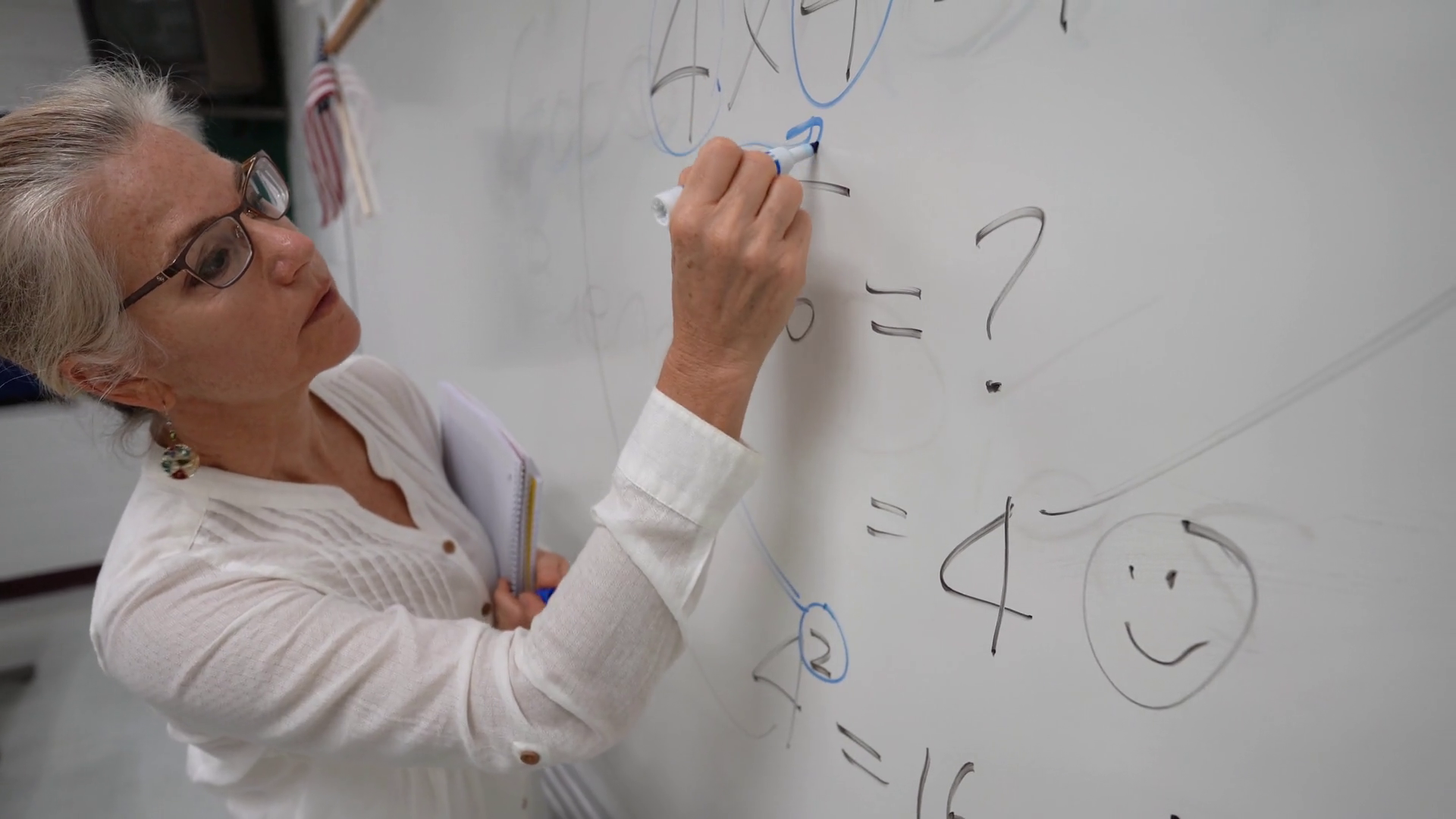 Female Teacher Writing Math Equations On Stock Footage SBV-352729925 ...