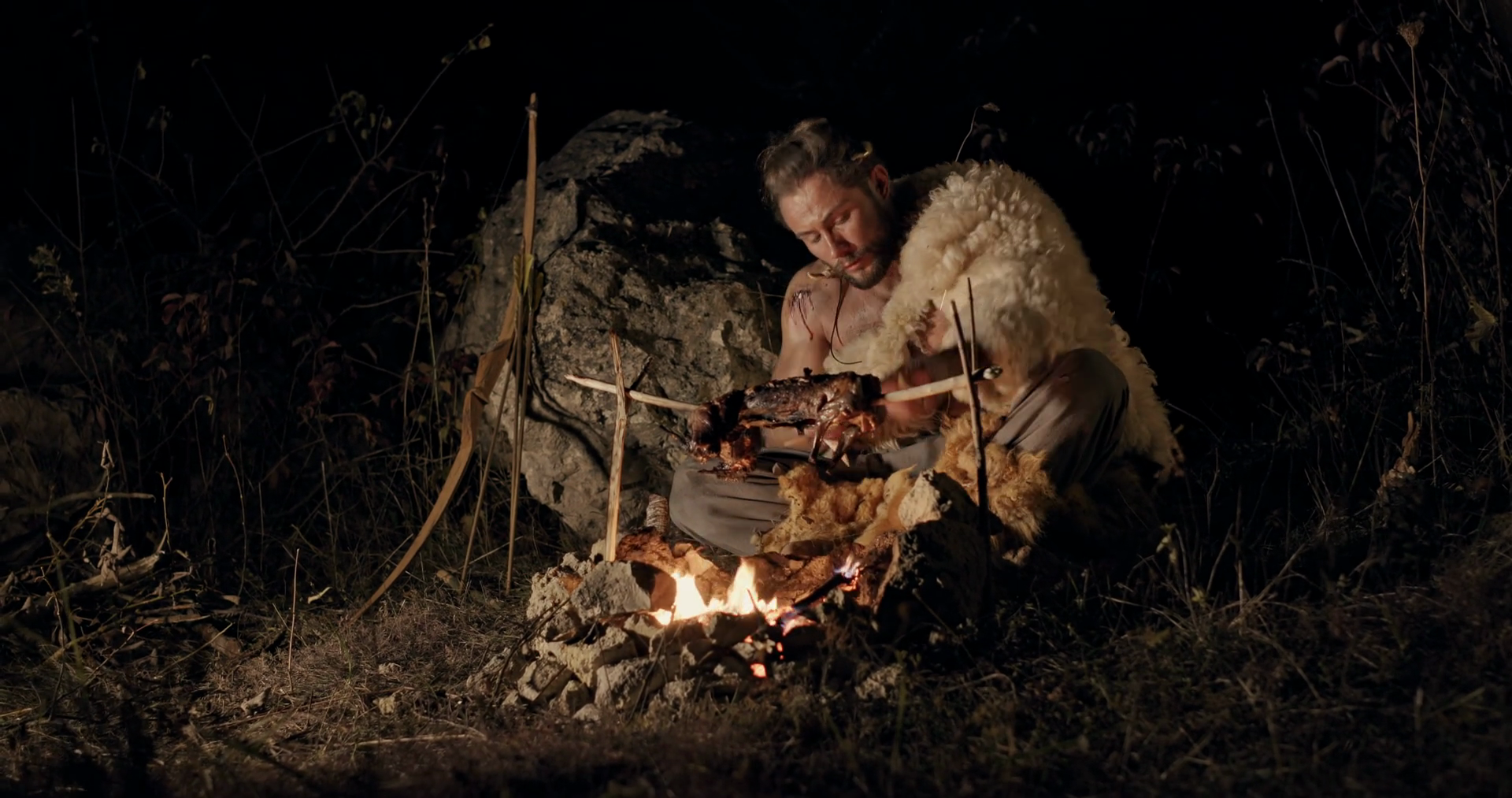 Hungry Barbarian Eating Meat Near Campfire Stock Footage SBV-351893455 ...