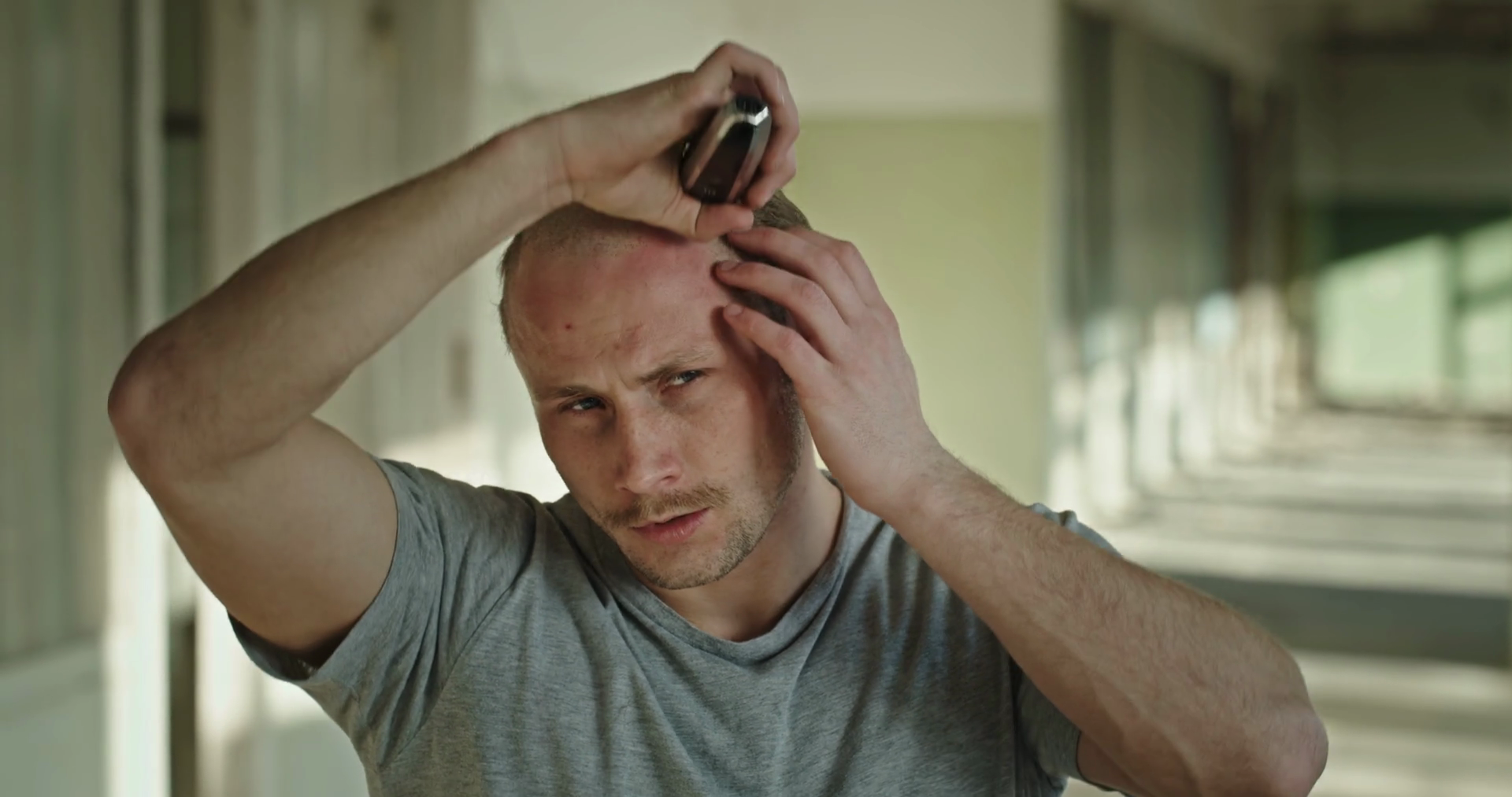 Stressed Man Shaving Head In Hallway Stock Footage SBV-351903703 ...