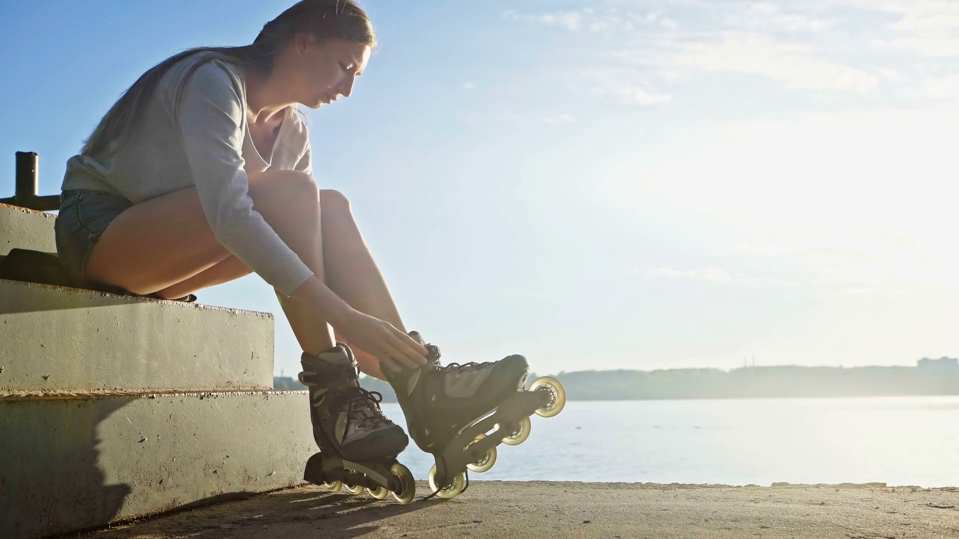 Young Girl Putting On Roller Skates At Stock Footage SBV-347621092 ...