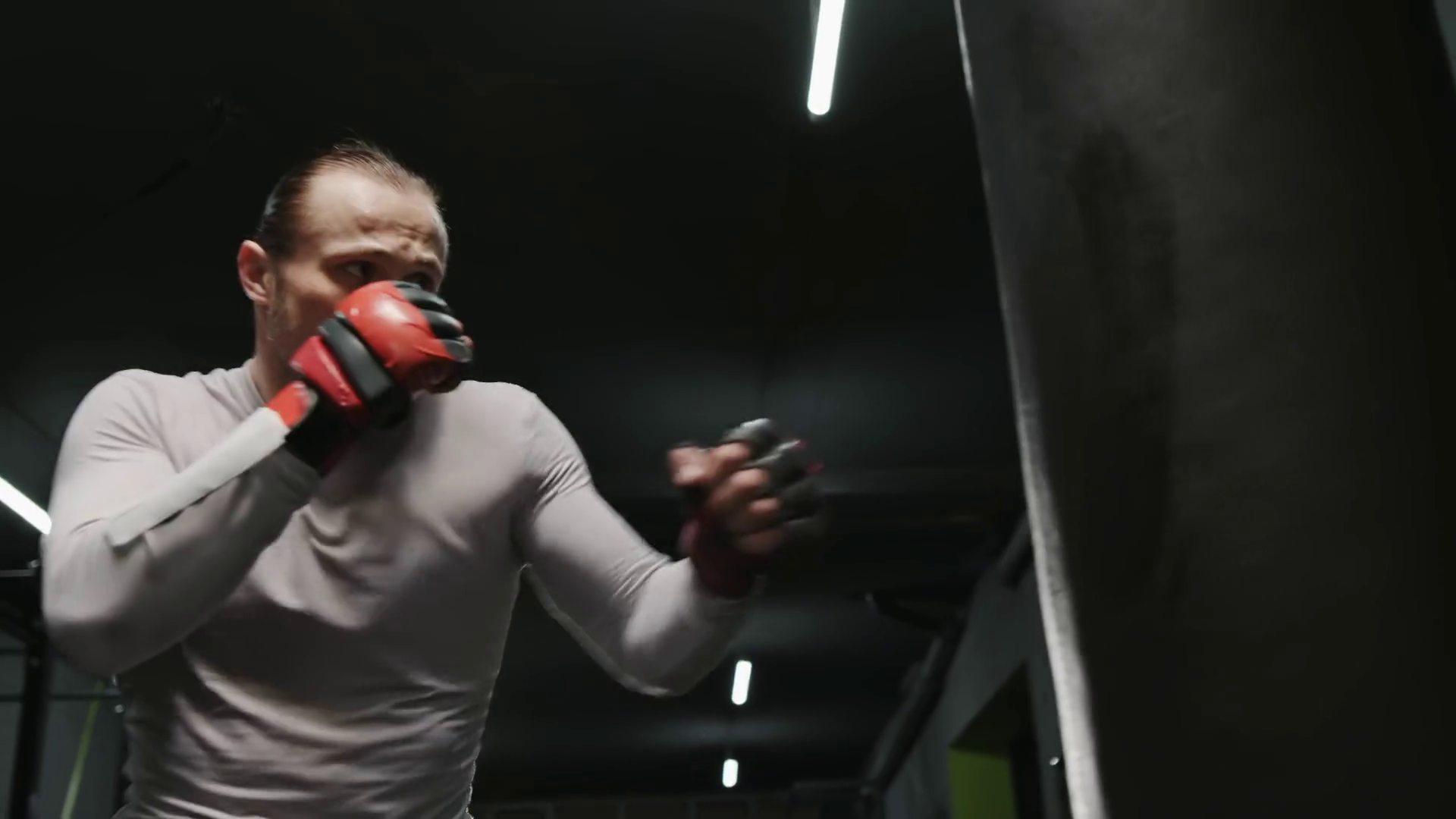 Angry Boxer Punching Bag In Gym - From Below Stock Footage SBV ...