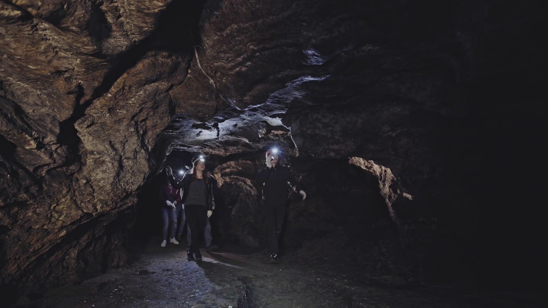 People With Headlamps Exploring Cave Stock Footage SBV-347657523 ...