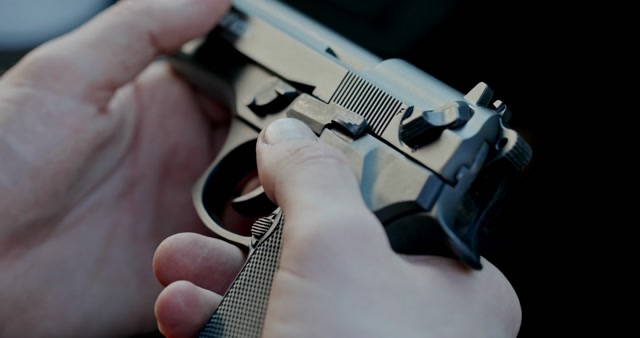 Loading A Gun Stock Footage: Royalty-Free Video Clips - Storyblocks