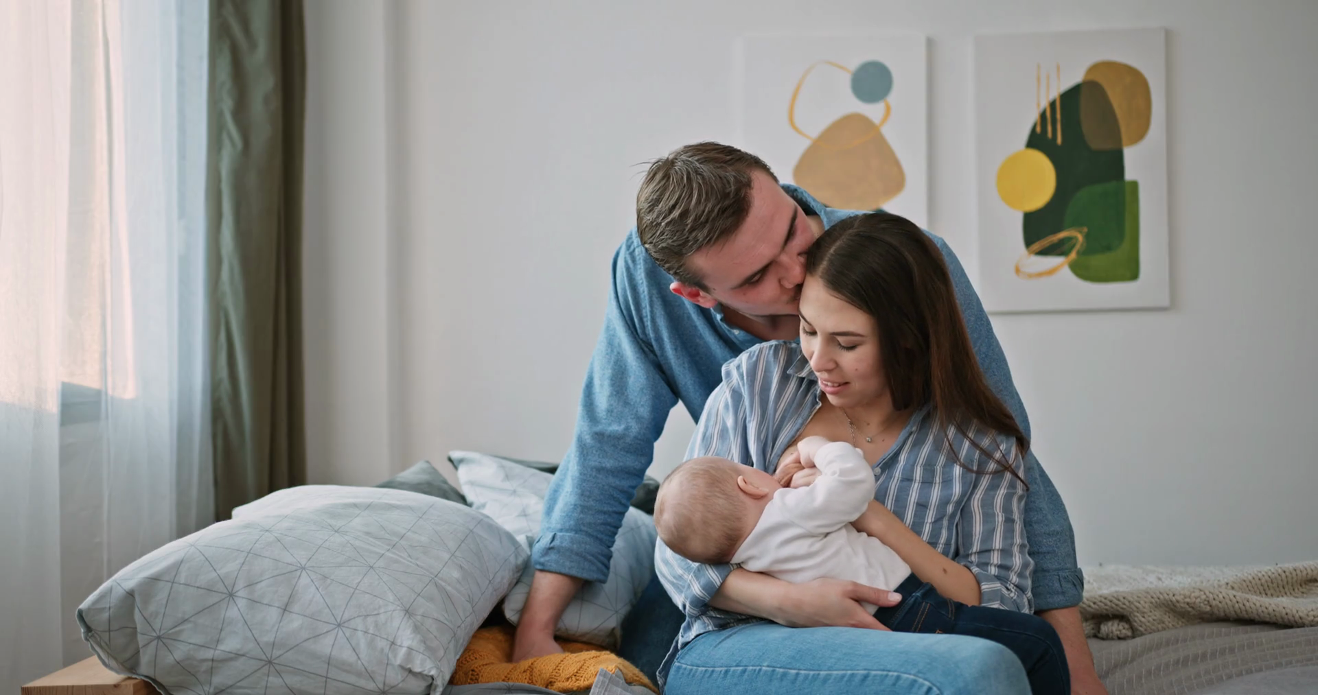Affectionate Parents Embracing Newborn In Stock Footage SBV-348866451 ...