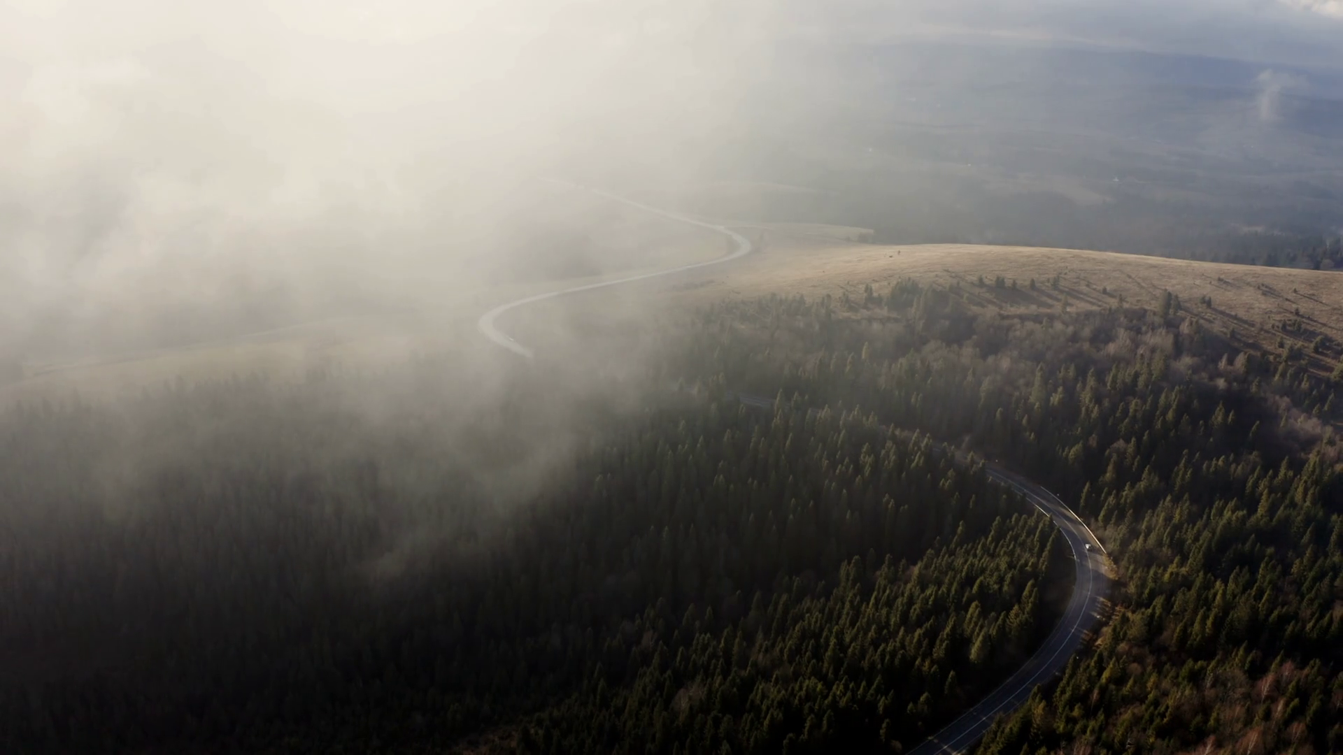Veiled In Mist: Aerial View Of Road Through Stock Footage SBV-348916876 ...