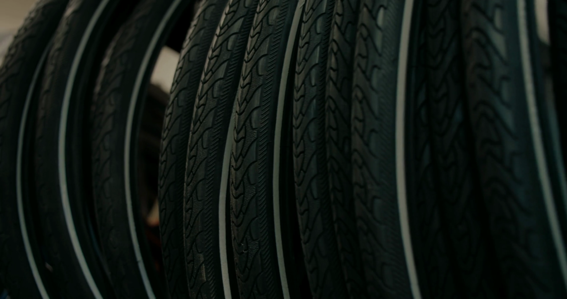 Bicycle Tires Lined Up On Wall Of Bike Shop Stock Footage SBV-348813777 ...