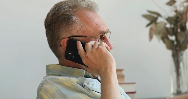 Person Talking On Phone Stock Footage: Royalty-Free Video Clips ...