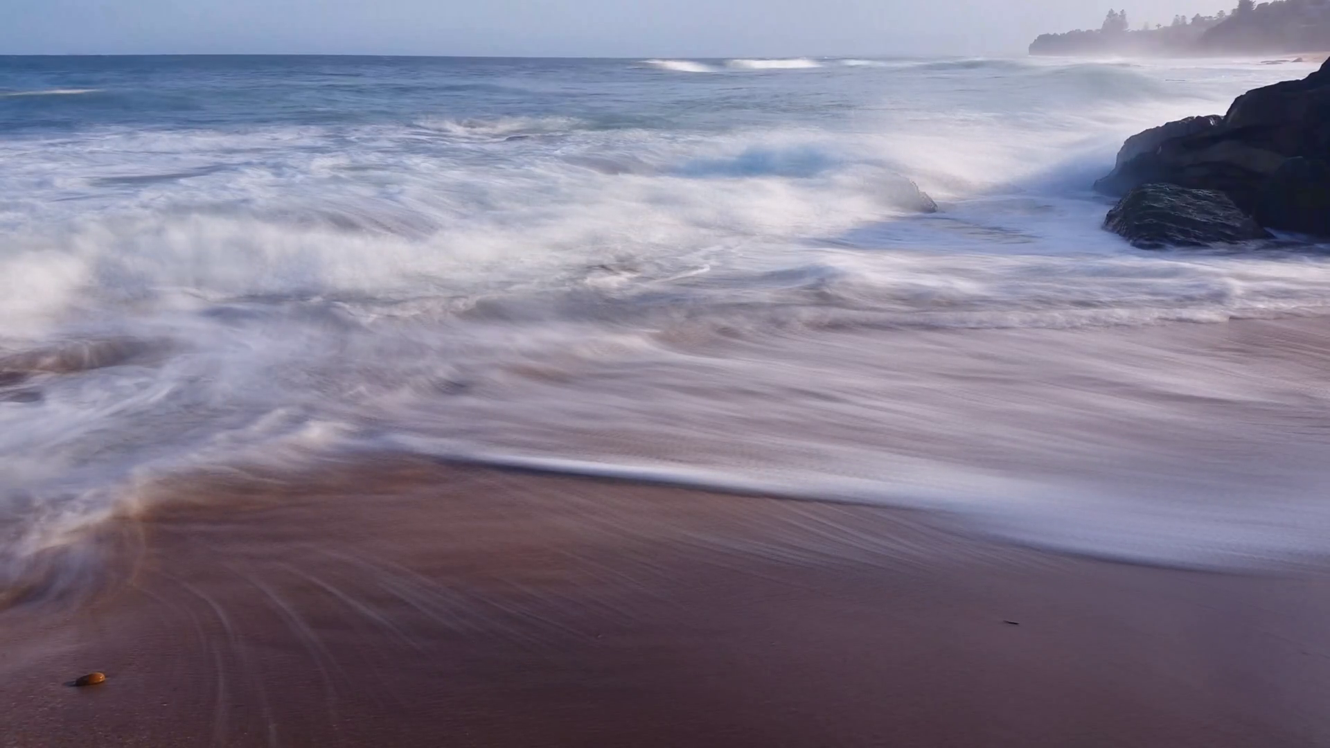 Moody Ocean Sea Waves Breaking On Coastal Beach Rock Platform With