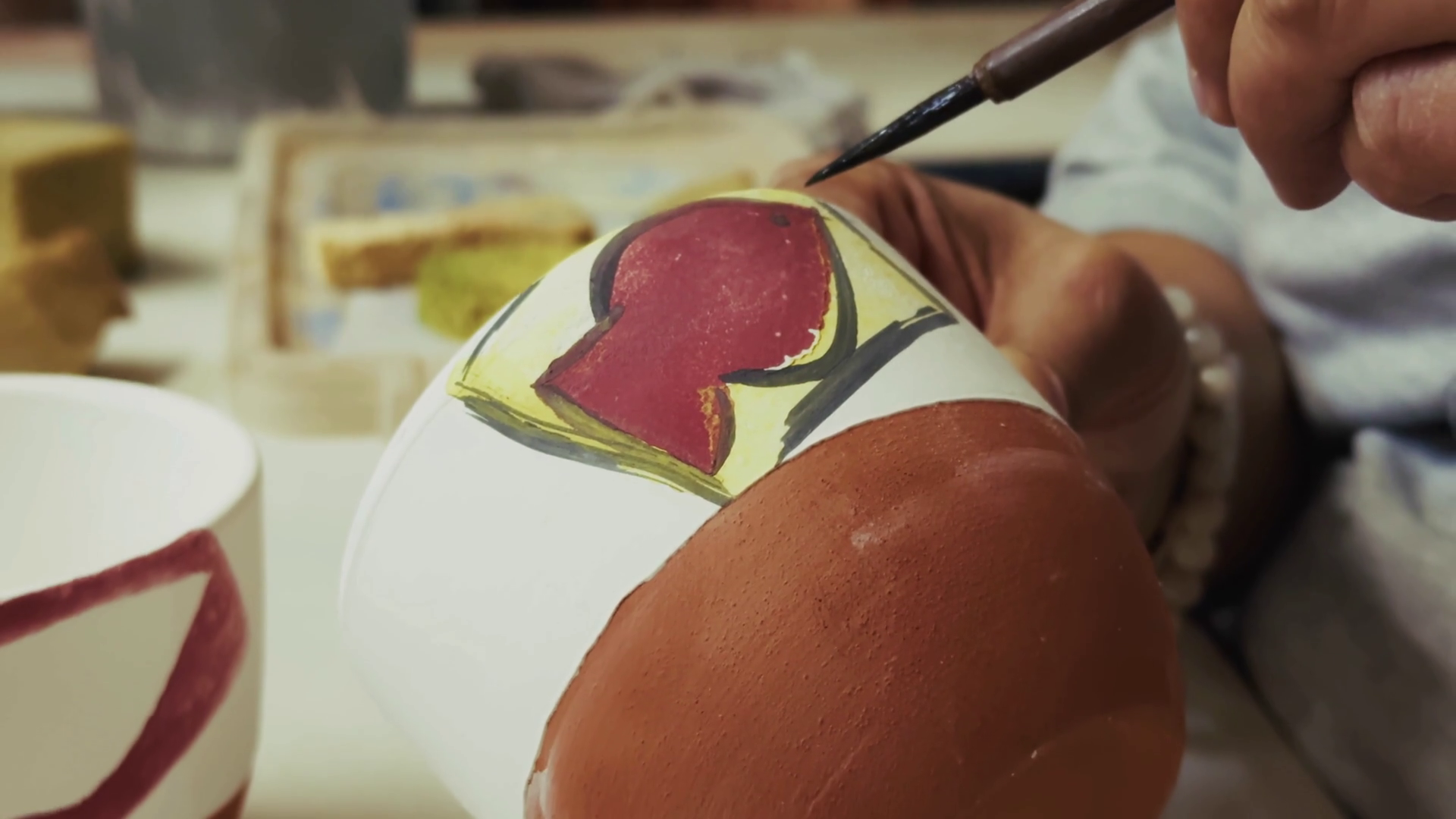 Painting Cup In Ceramic Workshop Stock Footage SBV-352140830 - Storyblocks