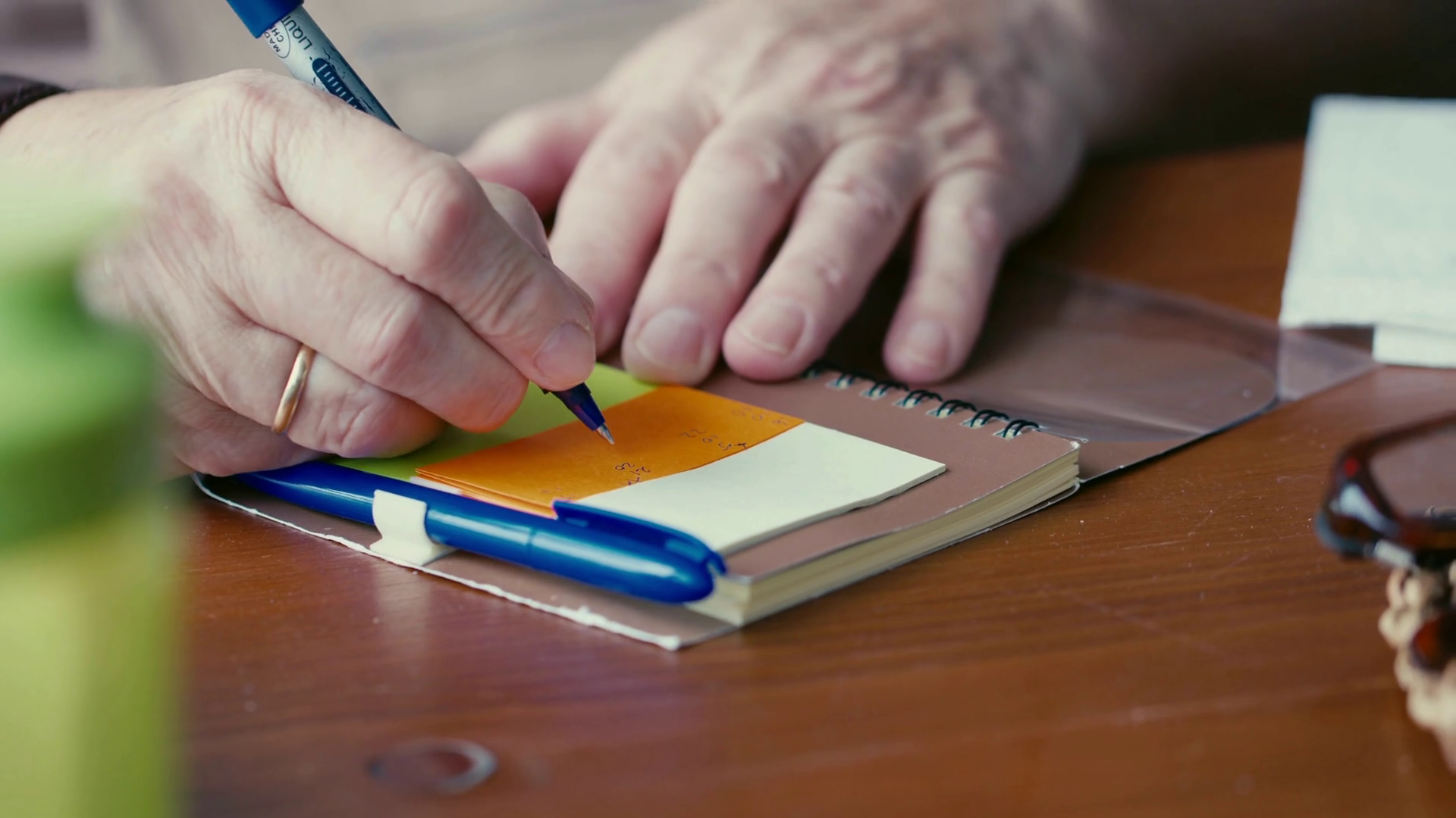 Elderly Man Is Taking Notes On Paper Stock Footage SBV-348919263 ...