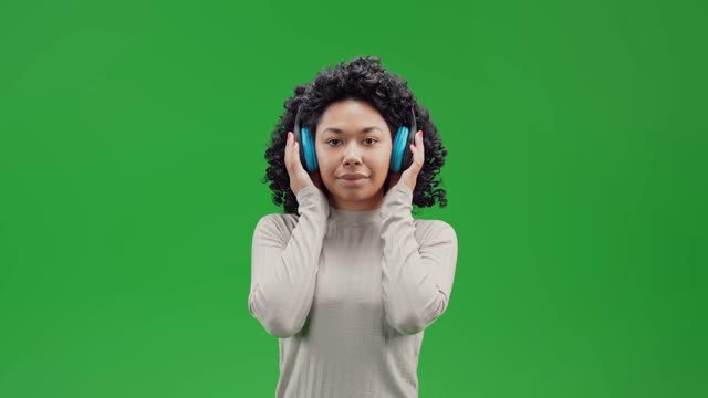 Headphones Greenscreen Stock Footage: Royalty-Free Video Clips ...