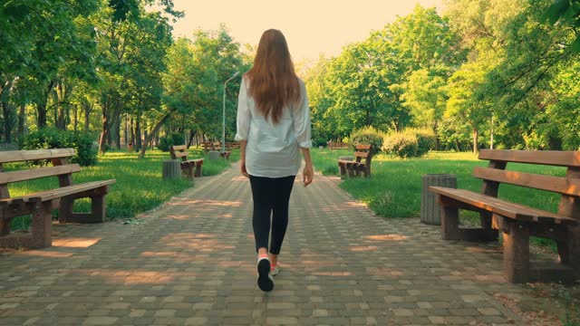 Woman Walking Towards Camera Stock Footage: Royalty-Free Video Clips ...