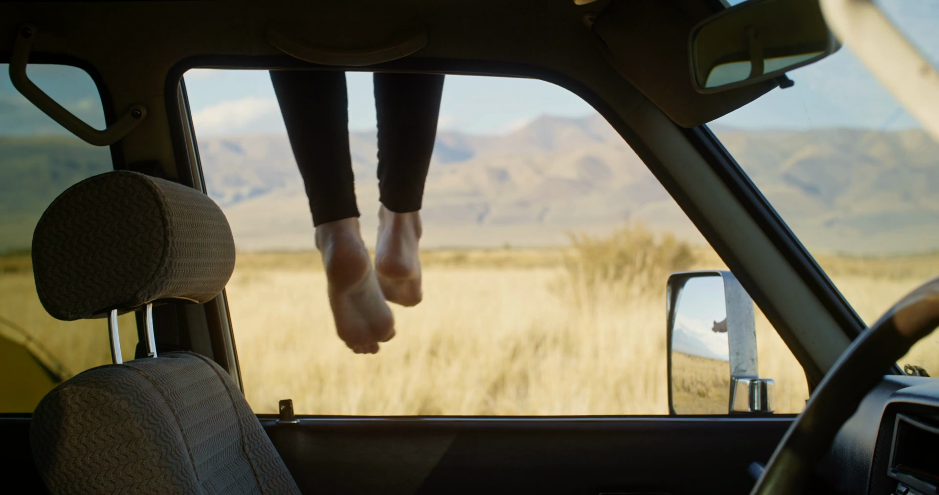 Woman Legs Playfully Dangling From Car Stock Footage SBV-351753227 ...