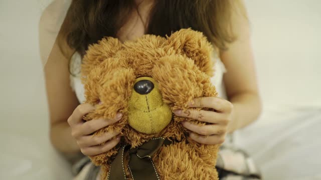Woman Teddy Stock Footage: Royalty-Free Video Clips - Storyblocks